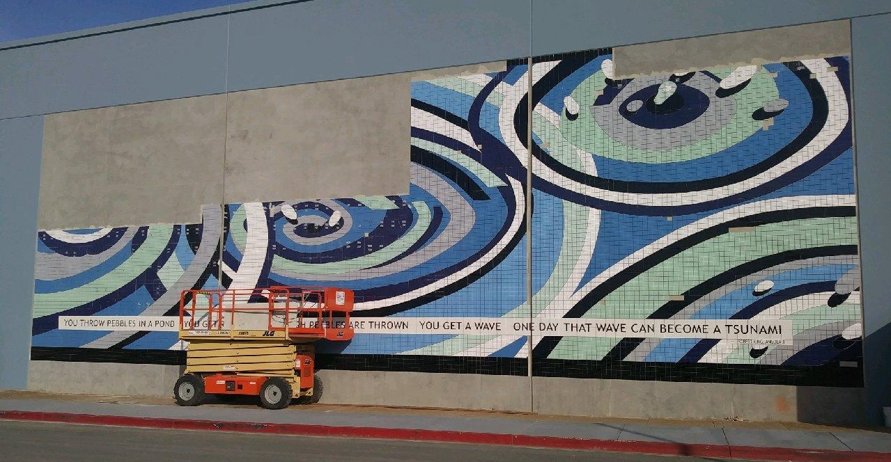 CalPot Collaborates With Artist Rigo 23 on ‘Pebbles In A Pond’ Mural ...
